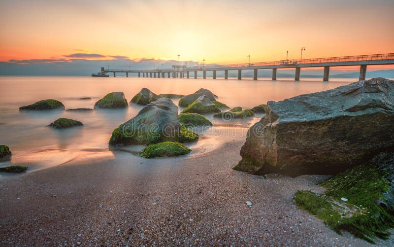 Sunrise Over the Beach and the Bridge Stock Photo - Image of morning ...
