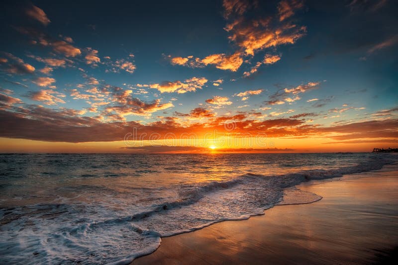 Sunrise over the beach stock image. Image of dramatic - 80993333