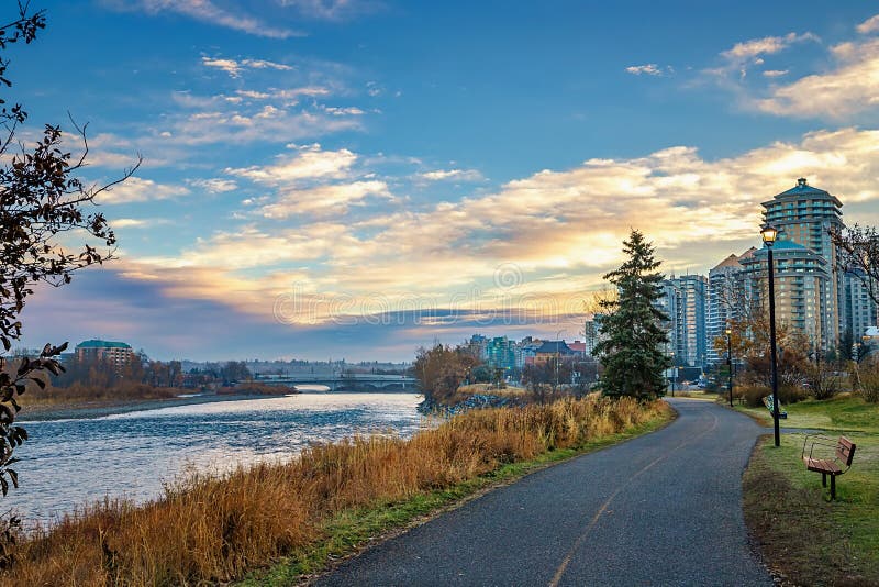 Sunrise Over the Bow River Pathway Stock Photo - Image of river, city ...