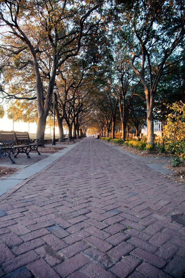 Sunrise over brick path stock image. Image of rising - 97610707