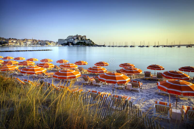 Sunrise over Calvi beach stock image. Image of beds, french - 26131831
