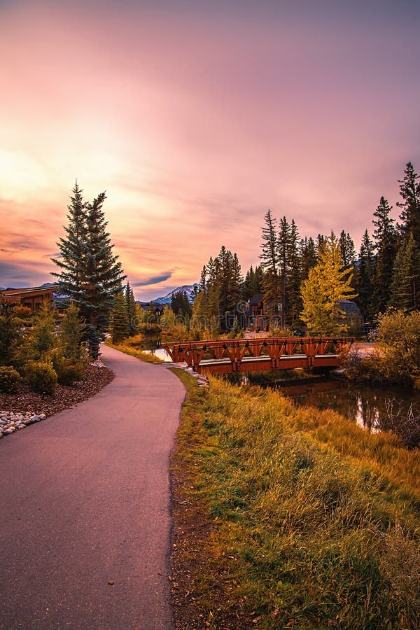 Sunrise Over a Canmore Park Pathway Stock Photo - Image of tourism ...