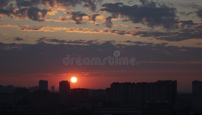 Sunrise Over the City. the Sun Rises Above the Horizon Stock Photo ...