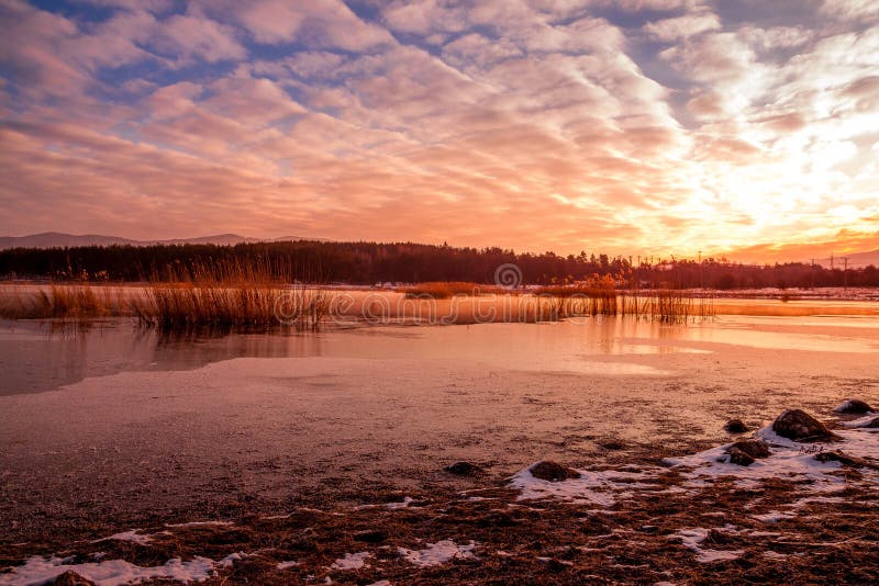 Sunrise over a dam stock photo. Image of landscapes - 140460684
