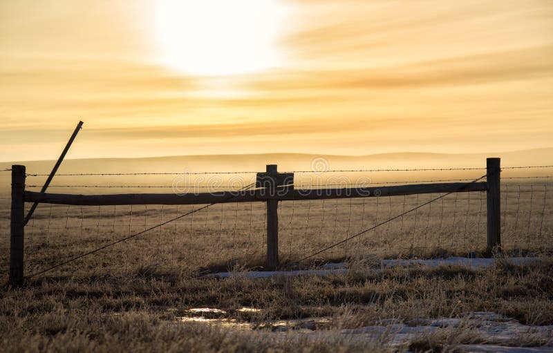 Sunrise over a fence gate stock image. Image of yellow - 38789165