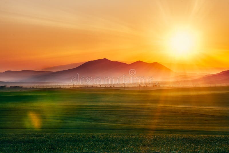 Sunrise over field stock image. Image of nature, hill - 89856791