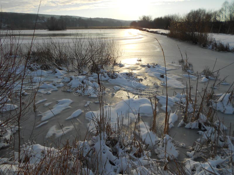 Sunrise Over the Frozen Lake Stock Photo - Image of lake, field: 84290982