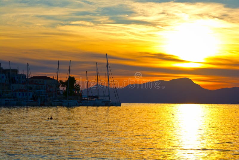 Sunset Over a Greek Island. Stock Image - Image of cloud, fiery: 1827673