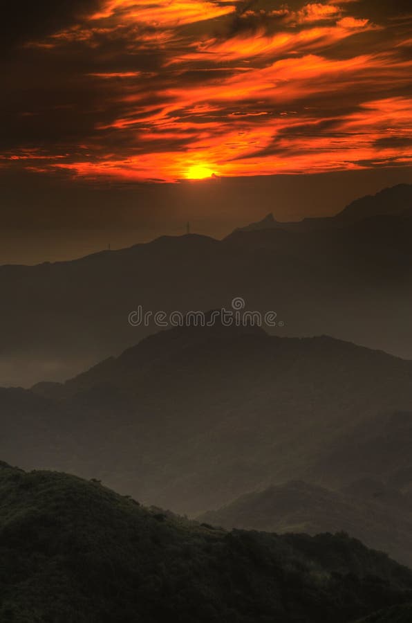 Sunrise over the hills stock photo. Image of mountains - 135989218