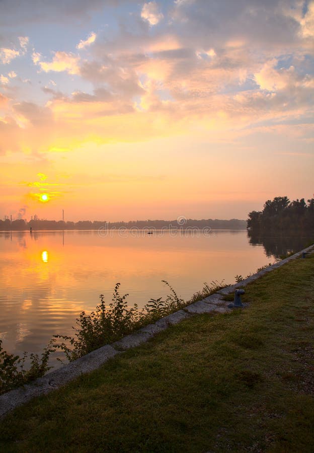 Sunrise Over a Lake in Autumn with Some Mist Stock Photo - Image of ...