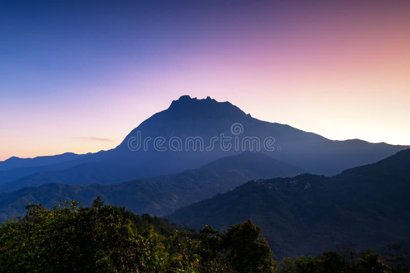 Sunrise Over Mount Kinabalu Stock Photo - Image of magenta, landmark ...