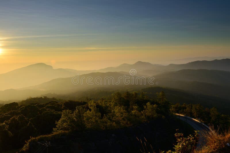 Sunrise over mountain stock image. Image of hill, tree - 35046487