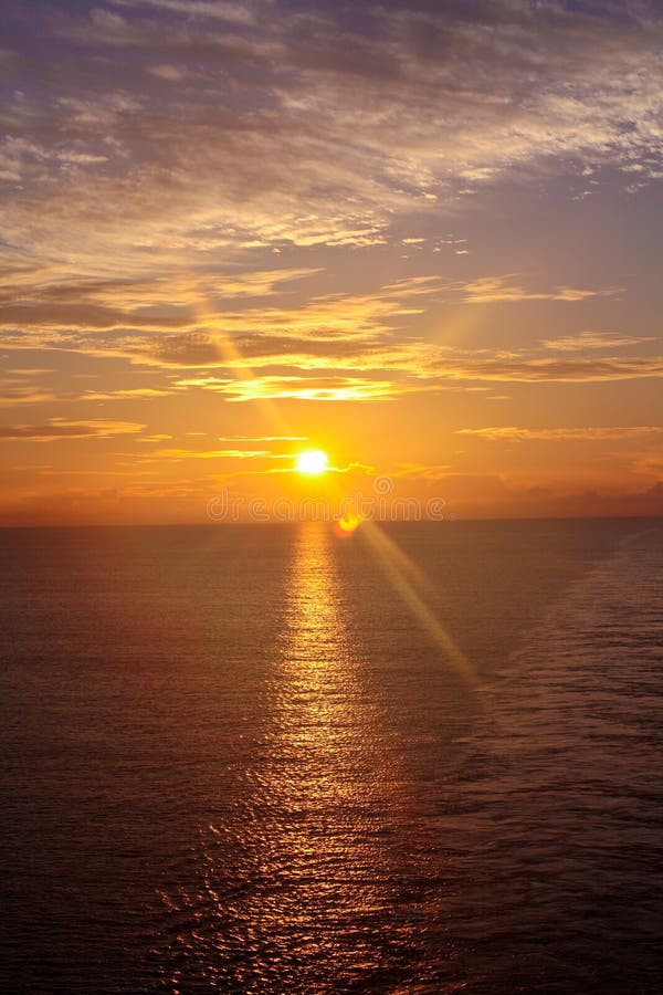 Sunrise Over the Ocean 14 stock image. Image of sunrise - 45391525