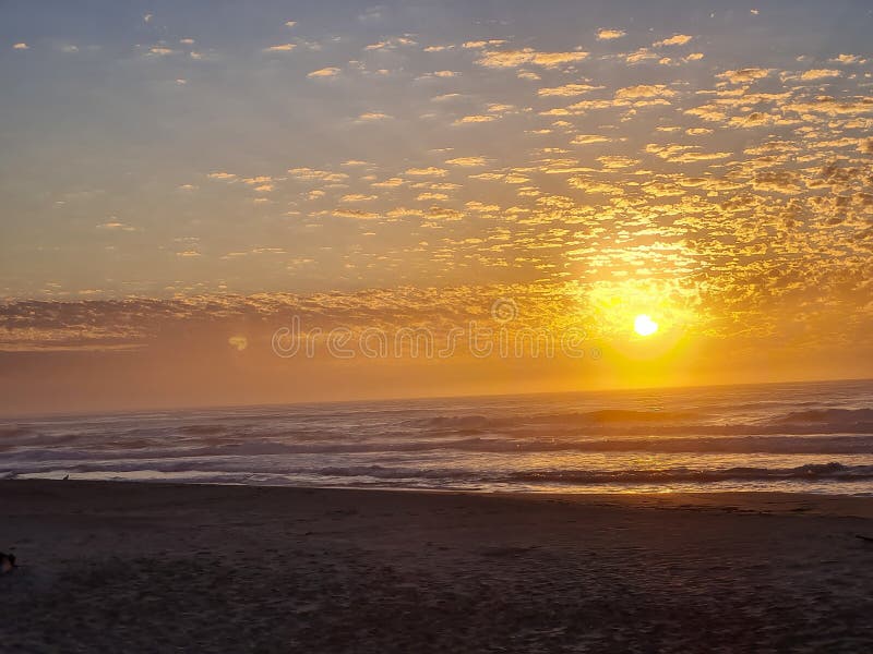 Sunrise Over Ocean with Clouds and Blue Sky Stock Photo - Image of ...