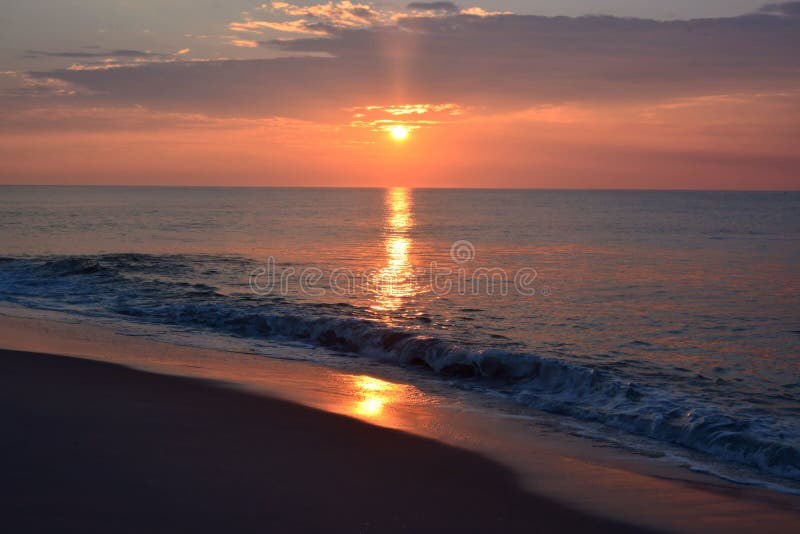 Sunrise Over Ocean stock image. Image of cloud, island - 77000587