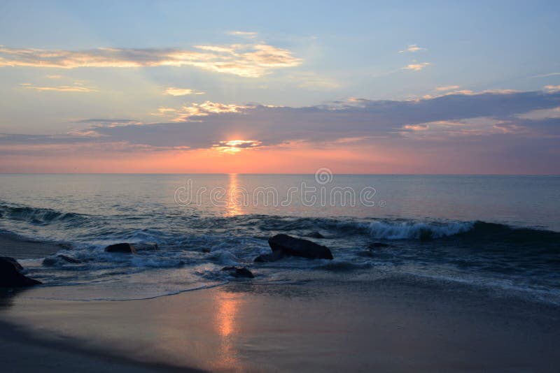 Sunrise Over Ocean stock photo. Image of horizon, color - 77000710
