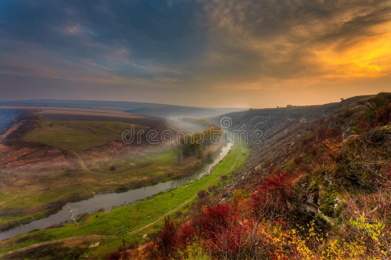 Sunrise over a river stock photo. Image of autumn, clouds - 191137048