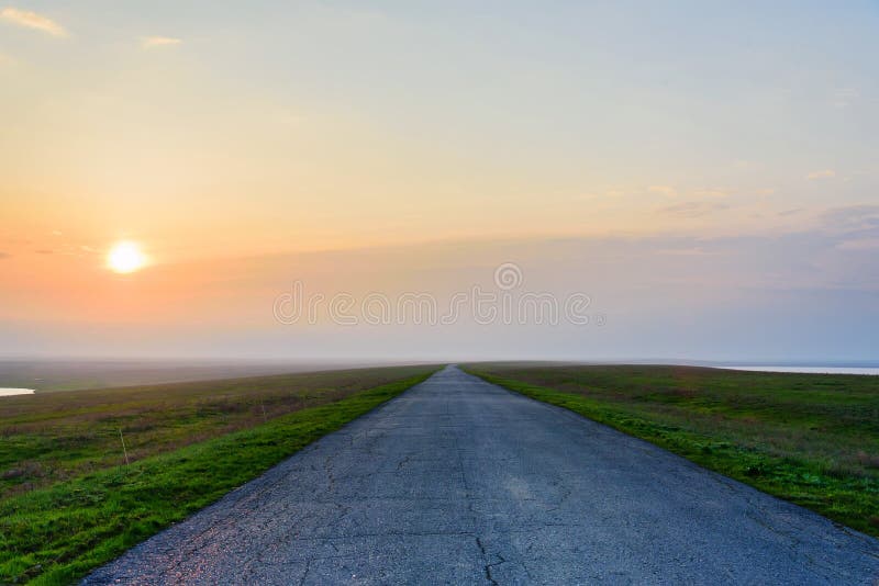 Sunrise over the road stock photo. Image of horizon, serene - 91624654