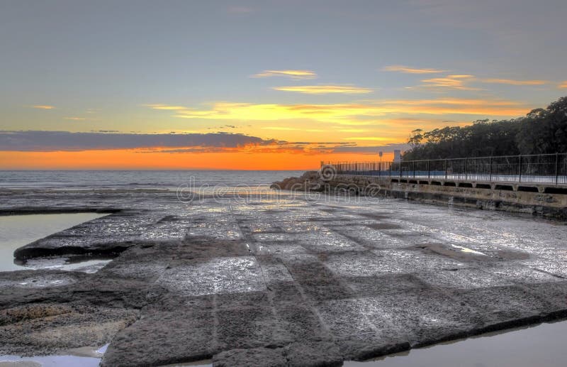 Sunrise over a rock pool stock image. Image of nature - 20038161