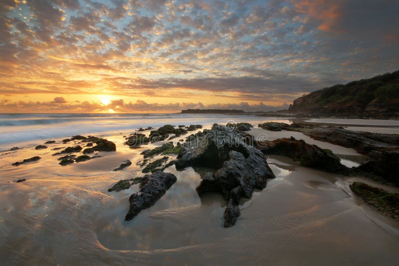 Sunrise Over the Rocks at the Beach at Evans Head in Australia Stock ...