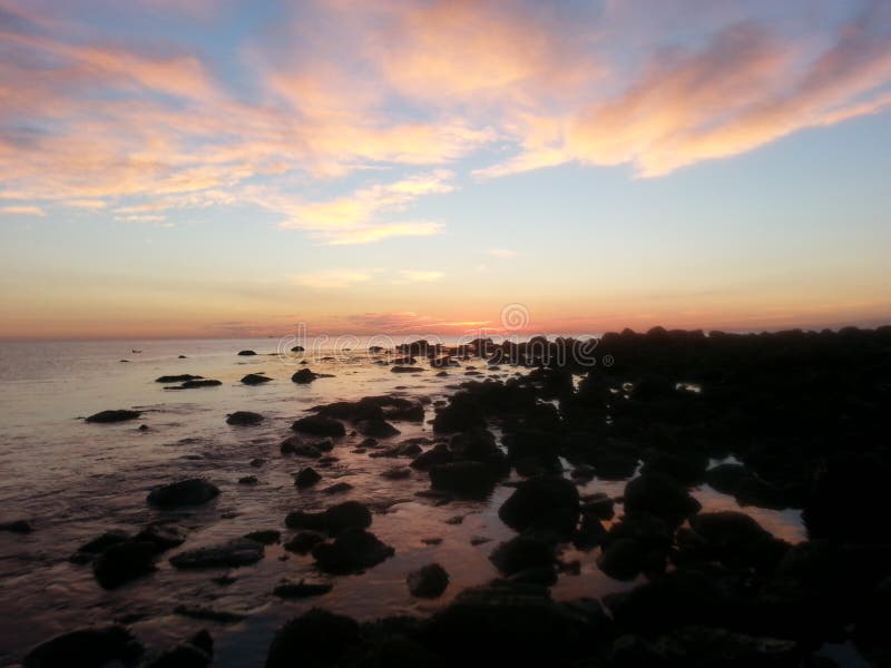 Sunrise over Rocks stock photo. Image of horizon, dusk - 83565496