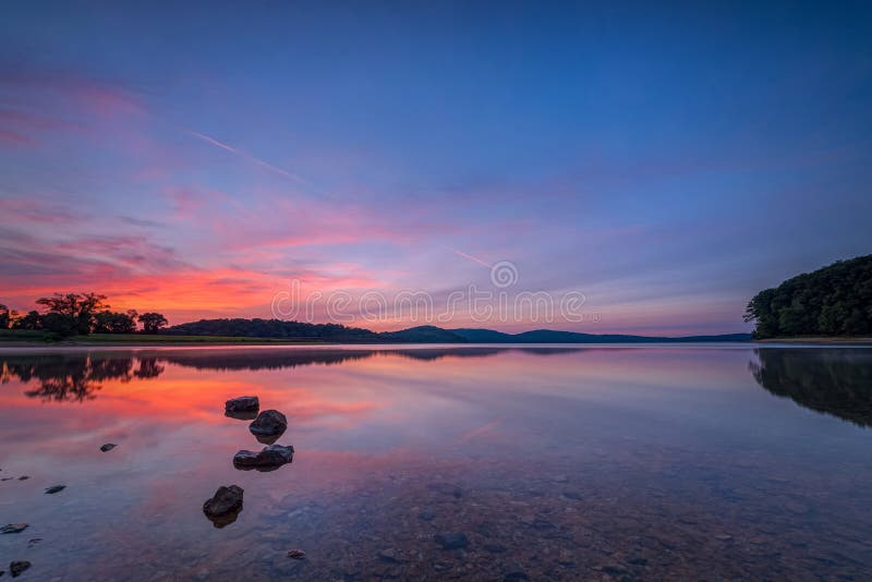 Sunrise Over Round Valley Reservoir Stock Photo - Image of serene ...