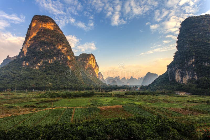 Sunrise Over a Valley of Limestone Hills Stock Photo - Image of guilin ...