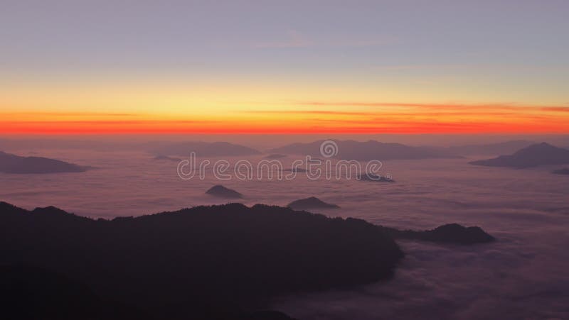Sunrise Over Village in the Mist Stock Image - Image of morning, mist ...