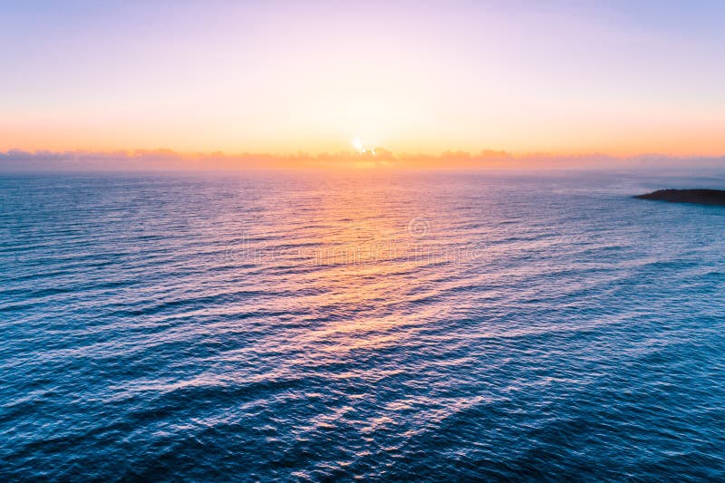 Sunrise over water. stock photo. Image of surf, outdoor - 140434054