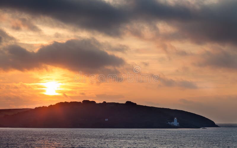 Sunrise at Pendennis Head stock photo. Image of head - 27492252