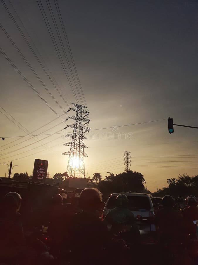 Sunrise at the Red Light Intersection with Tower Electric Editorial ...