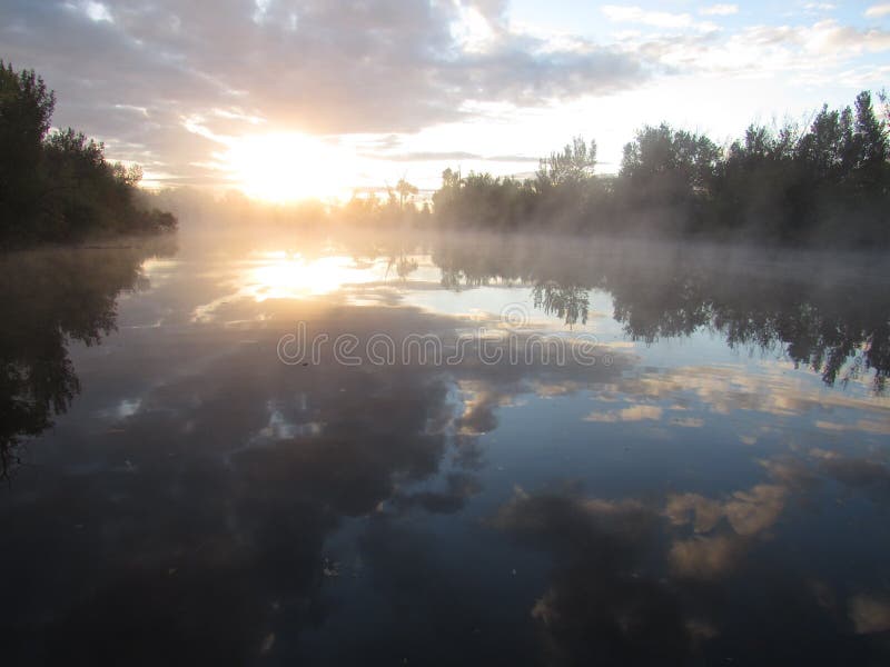 Sunrise Reflection on Morning Mist Lake Stock Image - Image of loch ...