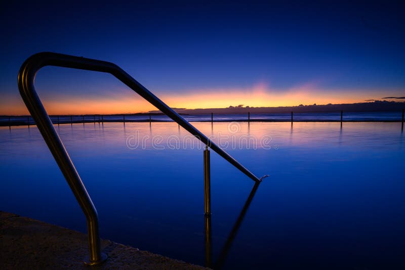 Sunrise Reflection in an Ocean Swimming Pool Stock Image - Image of ...