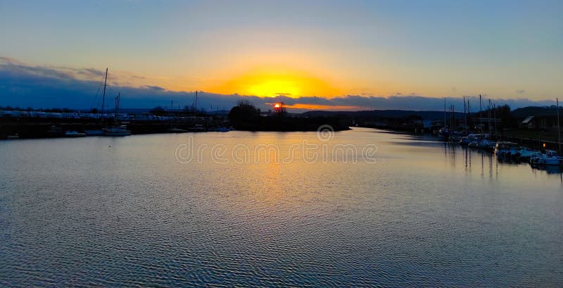 Sunrise Reflection in Water Stock Image - Image of sunset, afterglow ...