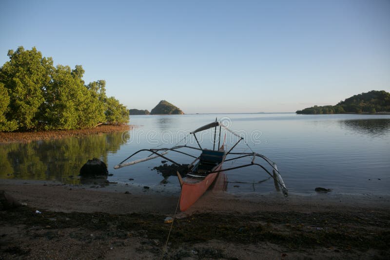 Sunrise on a Remote Beach in Asia Stock Photo - Image of fisherman ...