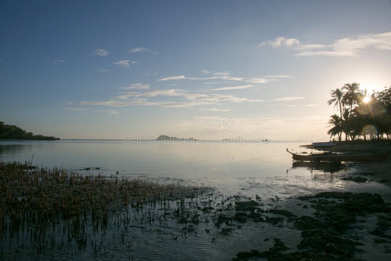 Sunrise on a Remote Beach in Asia Stock Photo - Image of water ...