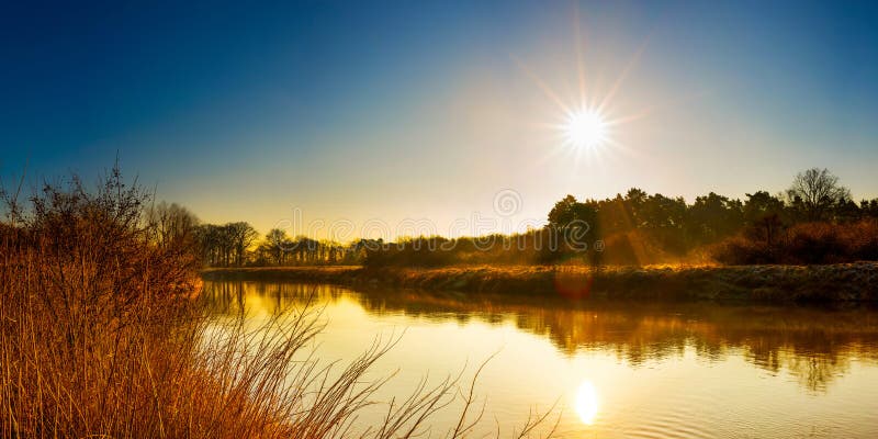 Sunrise at the river stock photo. Image of reflection - 99384814