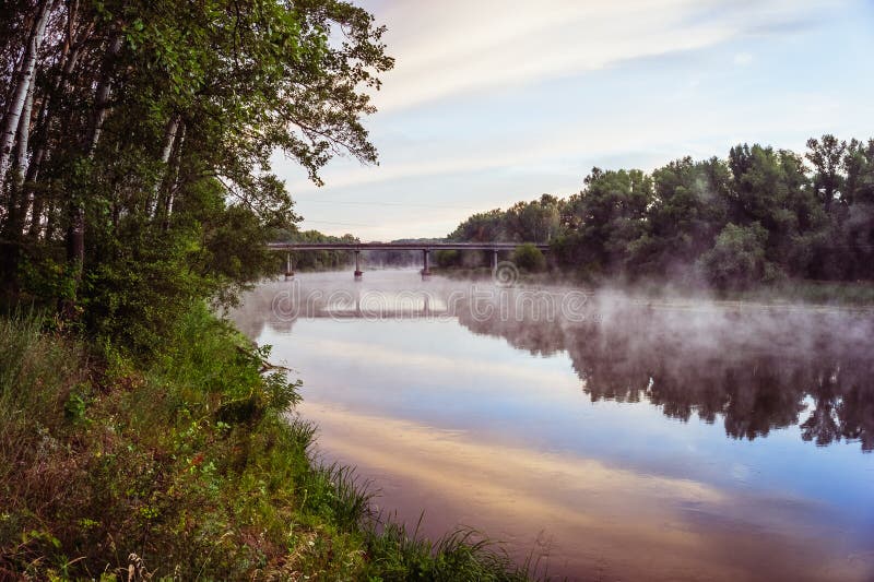 Sunrise on a River with a Mist Over the Water Stock Photo - Image of ...