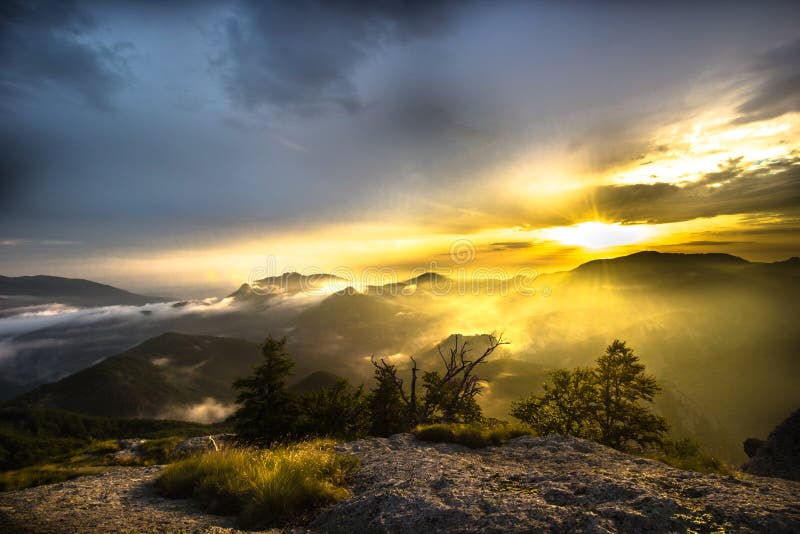 The sunrise from the rock stock image. Image of centuries - 162030869