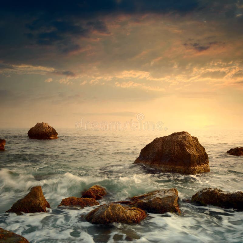 Sunrise on rocky sea coast stock photo. Image of edge - 18878584