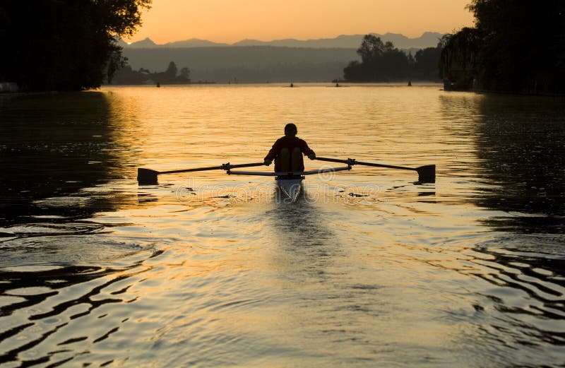 Single rower at sunrise stock image. Image of lifestyle - 7060693