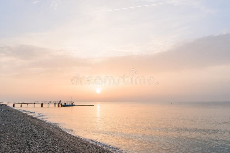 Sunrise at the Sea Beach. Calm Sea without Waves in the Morning Stock ...