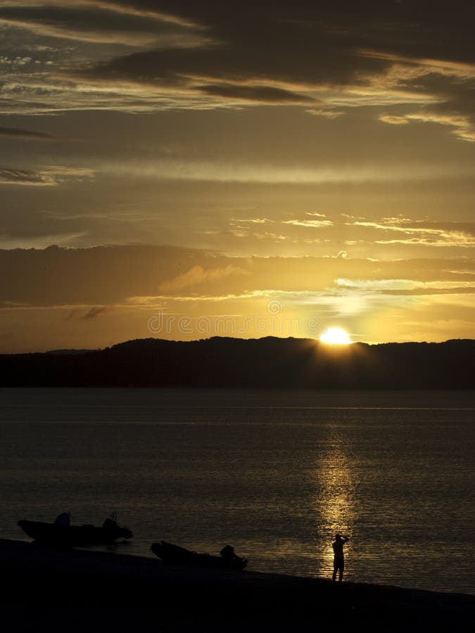 Sunrise with Silhouette Photographer Stock Photo - Image of warm ...