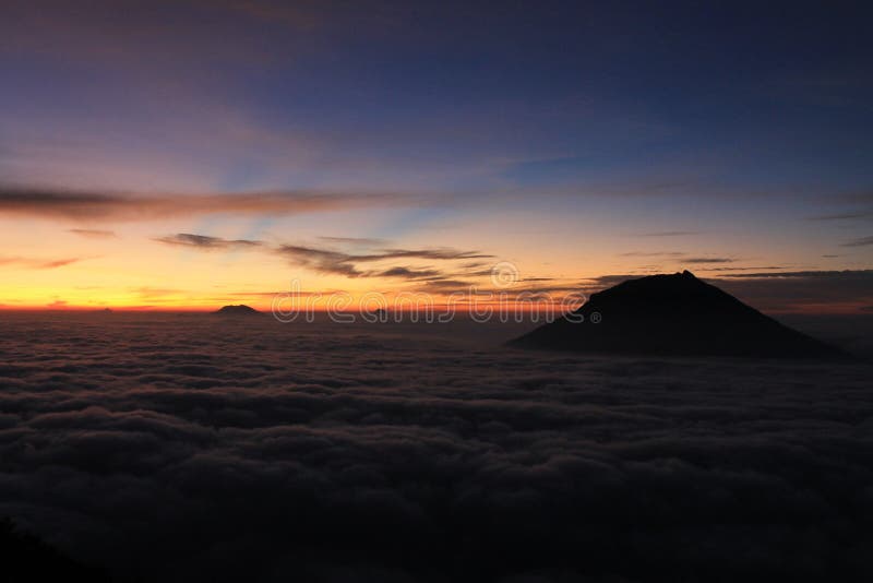 Sunrise sindoro mountains stock image. Image of dusk - 233448861