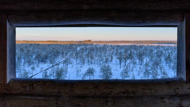 Sunrise Sky View from a Window of a Watchtower Over Snowy Bog and Small ...