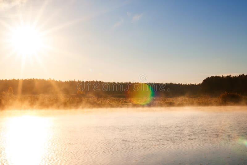 Sunrise or Sunset Over a Misty River. Mist Over the Water Stock Image ...