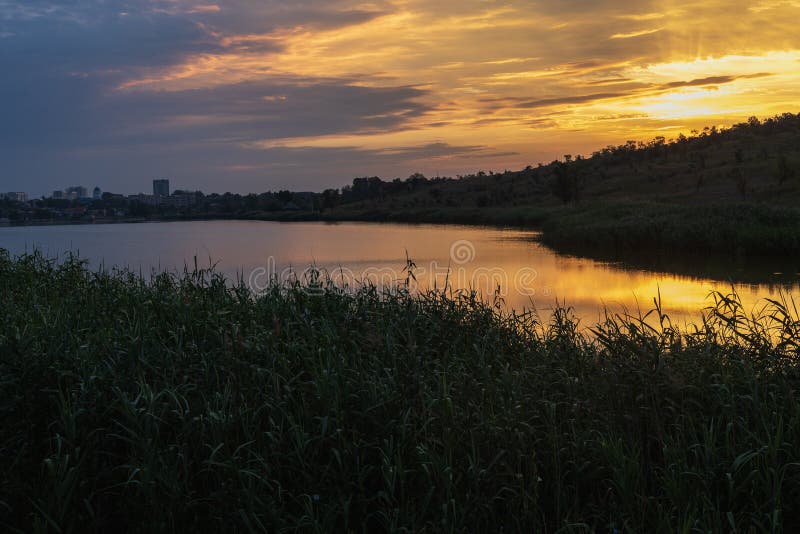 Sunrise or Sunset Over Small Lake. Contrast Sunlight Stock Image ...