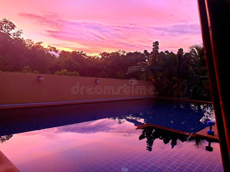 Sunrise in swimming pool stock image. Image of night - 245492767