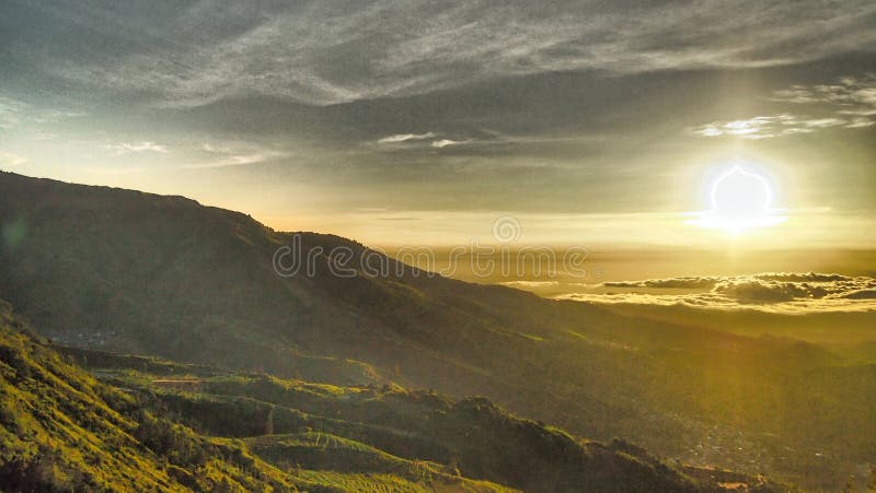 Sunrise at the Top of Sikunir Mountain Stock Image - Image of sunrise ...