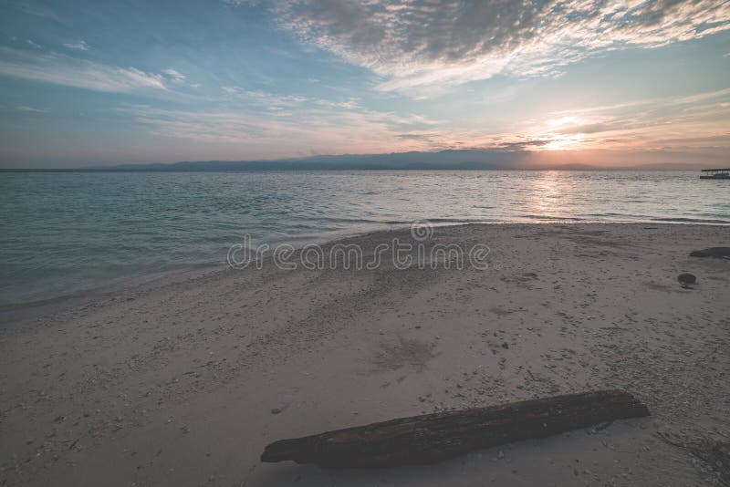 Sunrise on Tropical Beach, Wide Angle View in Backlight from the Coral ...